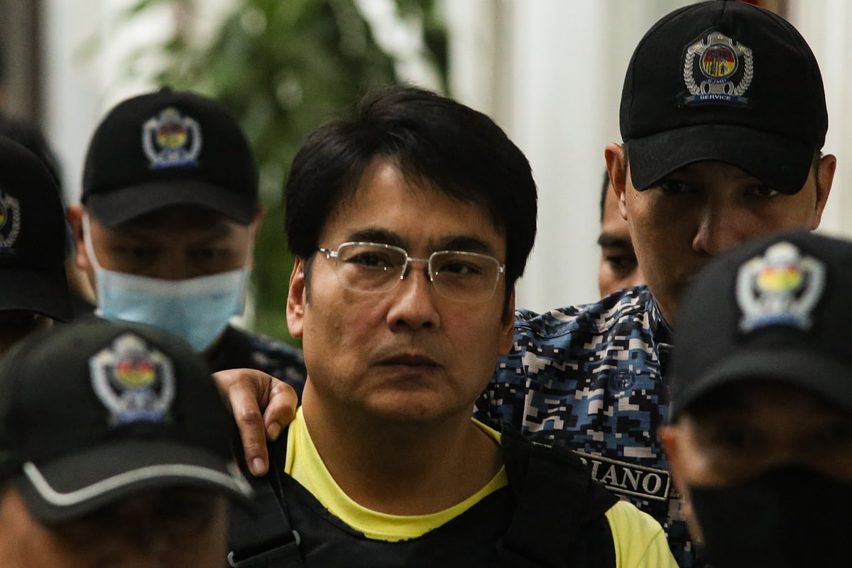 Former senator Bong Revilla appears before the DOJ