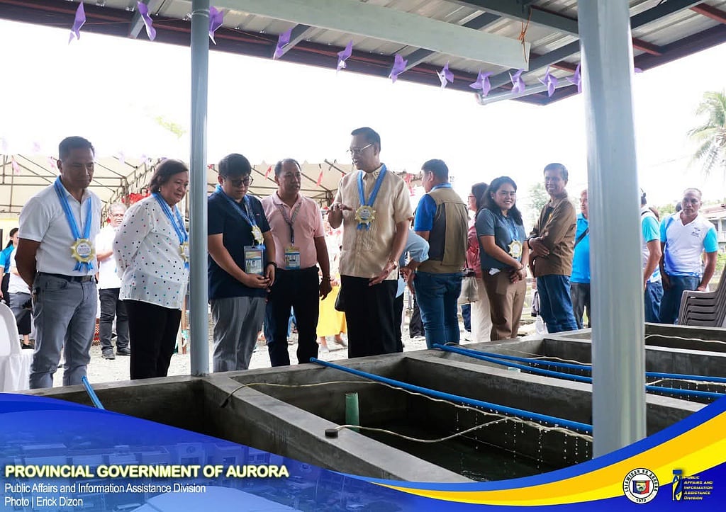 Aurora opens catfish hatchery, solar pumping system