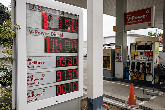 Gas stations use cardboard cutouts for their pricing displays as oil ...