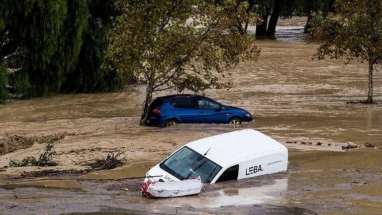 Sudden flood in Spain turns roads into rivers; sweeps away cars and ...