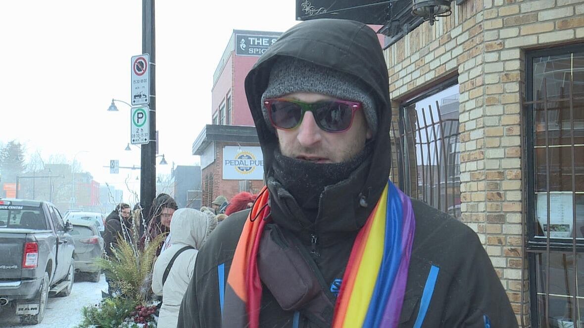 Calgary police charge social justice activist with stealing Canadian flag