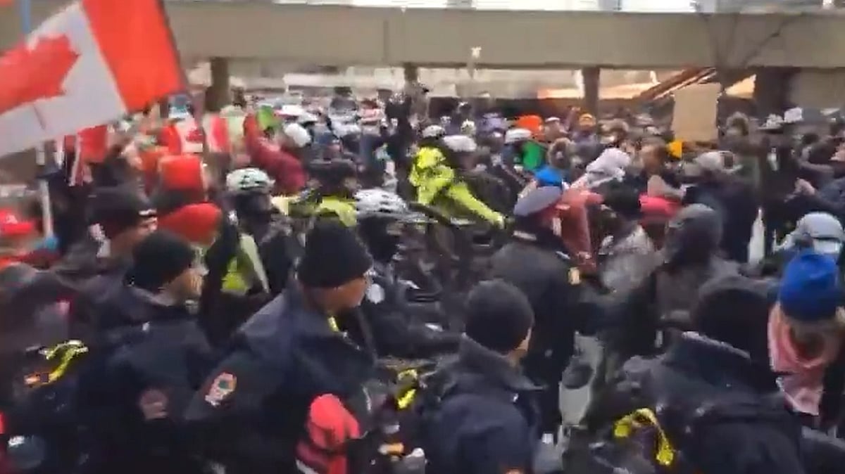 Toronto police arrest protestors after they attacked police officers