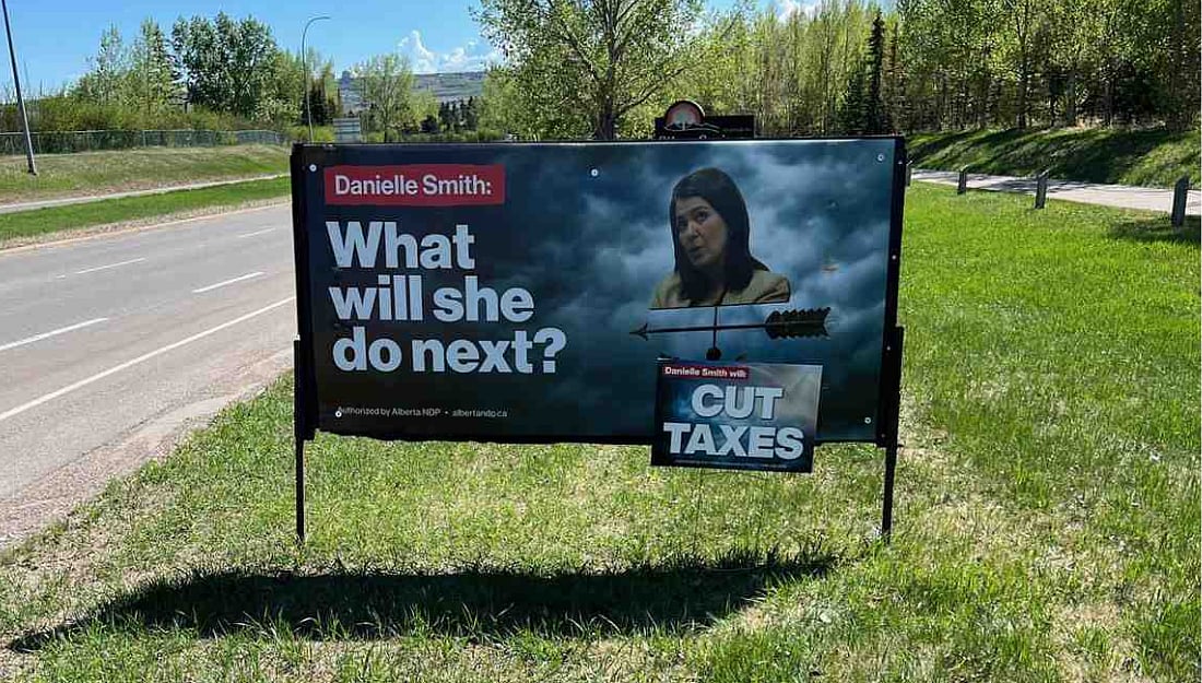 Strategic UCP sign placement foils Alberta NDP Smith attack ad