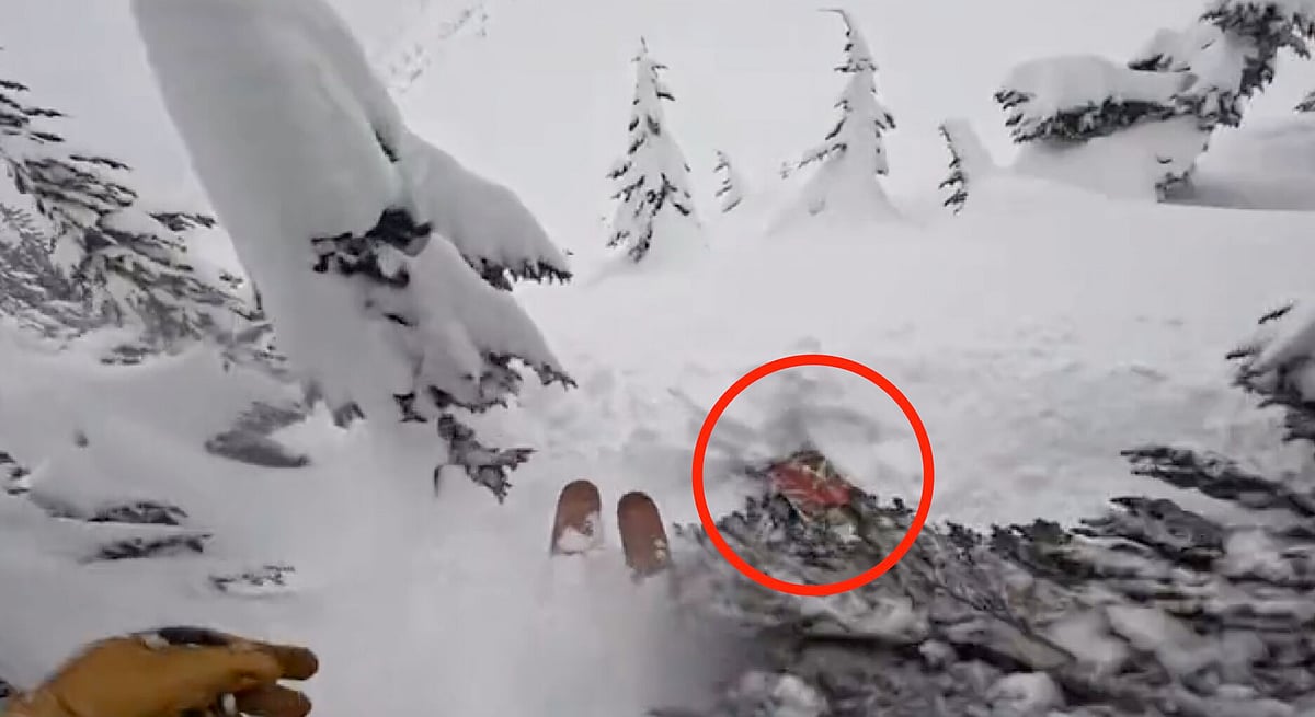 Skier rescued snowboarder buried in snow