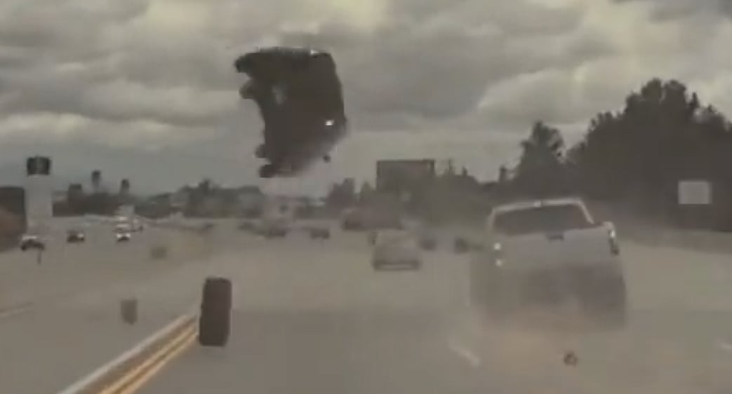 WATCH: Incredible video shows car flipping after being hit by loose tire